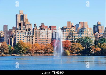 Fountain over lake in New York City Manhattan Central Park Stock Photo ...