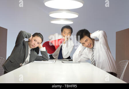 Team of business men and women covering one eye with hand with ...