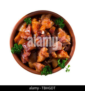 Delicious spanish dish Morro de cerdo, braised pig snout served in clay ...