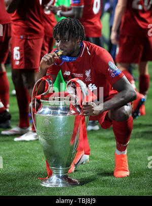 Liverpool's Divock Origi celebrates with the trophy after winning the ...