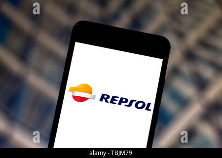 In this photo illustration, the Repsol logo is seen displayed on a ...