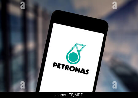 In this photo illustration Petroliam Nasional Berhad (PETRONAS) logo ...