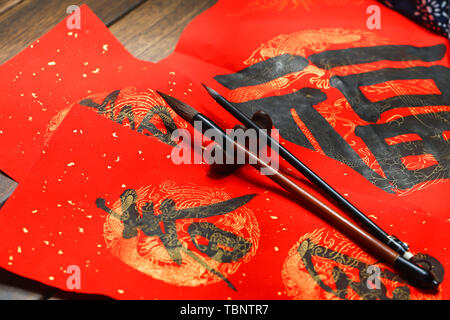 Handwritten blessings and couplets on the table Stock Photo - Alamy