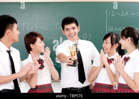 Teamwork among high school students Stock Photo - Alamy