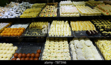 Bengali sweets sold at a sweet shop in Dhaka, Bangladesh Stock Photo ...