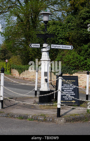 Pump, Signpost, and Lamp, at the crossroads, Hexton, Hertfordshire. The ...