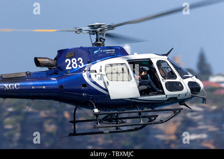Eurocopter AS 350B3 Helicopter VH-XGC conducting aerial filming over ...