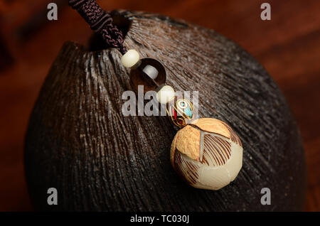 Bodhi pendant, necklace, wool chain Stock Photo - Alamy