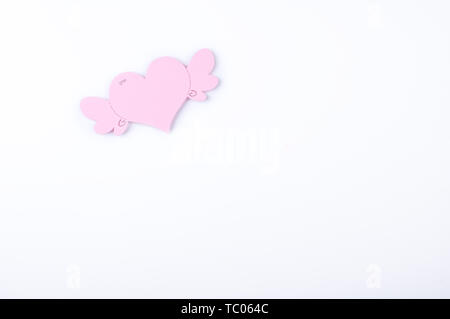 Pink cherubs love heart shape on white background Stock Photo - Alamy