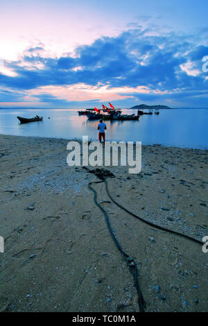 Chongwu Dayuan beach sunset Stock Photo - Alamy