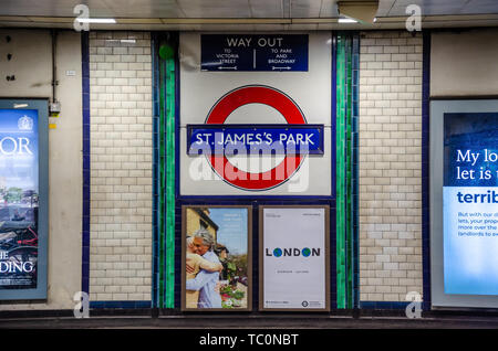Station name sign on the wall of Victoria station on the London ...