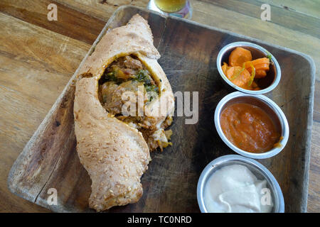 A traditional Syrian Kurdish snack called shamburak which is pastry ...