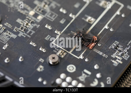 Closeup view of damaged graphic adapter burnt out after hack Stock ...