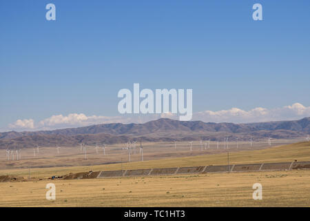 Gobi hill wind turbine Stock Photo - Alamy