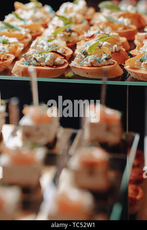delicious festive buffet with canapés and different delicious meals ...
