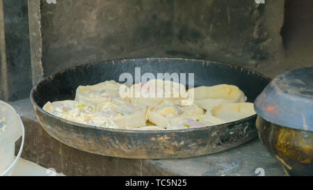 Process of cooking hot pies with chicken and cheese Stock Photo - Alamy