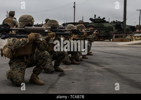 Marines from 2nd Battalion, 4th Marine Regiment, flee mortar rounds ...
