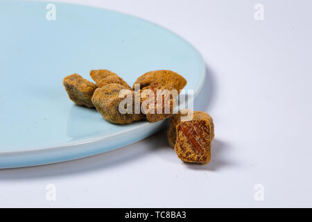 Delicious snack pork grains Stock Photo - Alamy