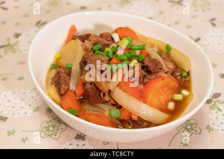 Braised Beef Brisket with Tomato Stock Photo - Alamy
