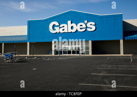 A logo sign outside of a Gabe's retail store location in Martinsburg ...