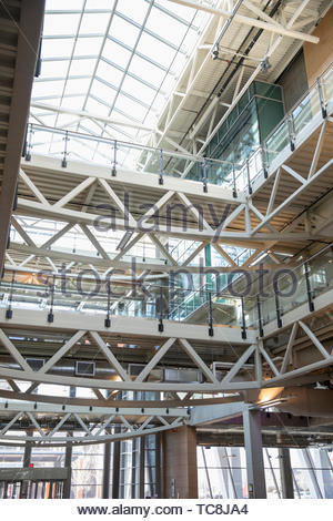 Low angle view to balconies of modern multistory, looking up from ...