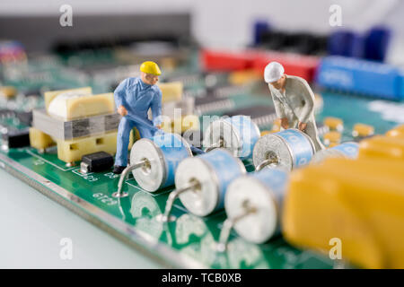 Construction crew fixing circuit Stock Photo - Alamy