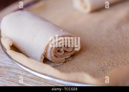 African food. Injera is a sourdough flatbread made from teff flour. It ...