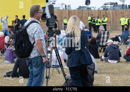 A camera crew setting up for a live broadcast Stock Photo - Alamy