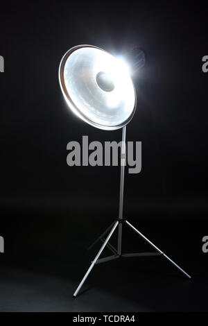 Studio flash with beauty dish on grey background Stock Photo - Alamy