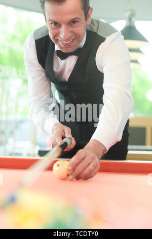 Billiard player portrait at billard table or snooker american billiards ...
