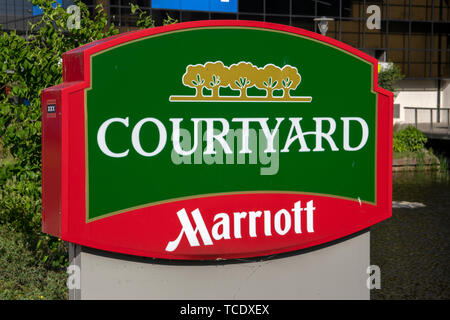 Close up Marriott Hotel sign & banner above entrance converted from ...