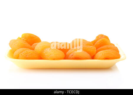 delicious dried apricots in packaging isolated on white Stock Photo - Alamy