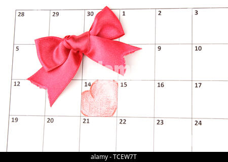 Calendar page with hearts and bow on St.Valentines Day Stock Photo - Alamy