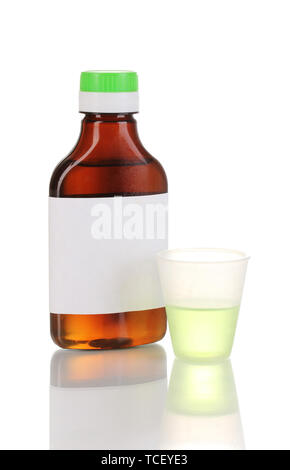 Medical bottle and jigger isolated on white Stock Photo - Alamy