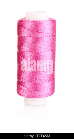 Pink bobbin thread isolated on white Stock Photo - Alamy