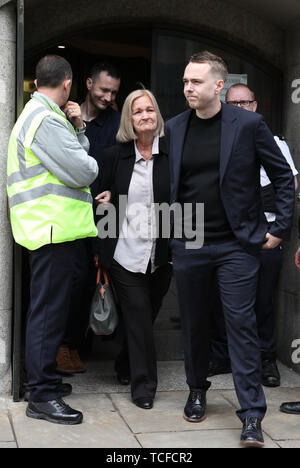 Sally Challen, flanked by her sons James (left) and David (right ...