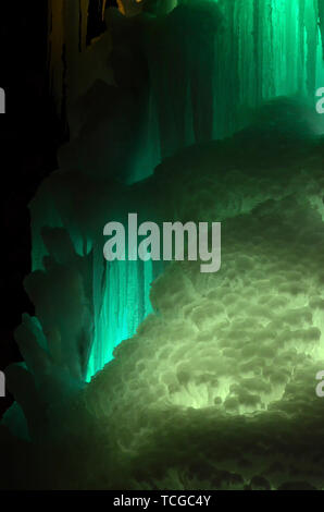 Huge ice icicles. Fragment of large blocks of ice frozen waterfall of ...