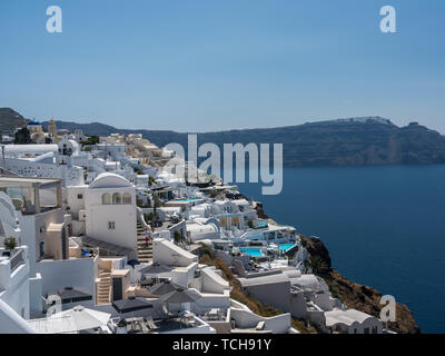 Crowded cave houses on cliff in Fira Santorini Stock Photo - Alamy