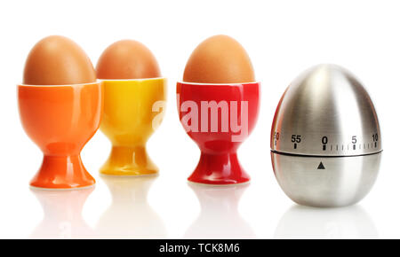 egg timer and egg in color stand isolated on white Stock Photo - Alamy