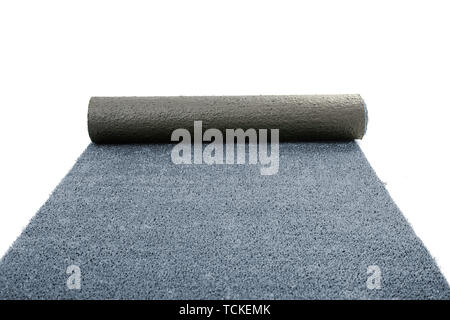 Artificial rolled grey grass isolated on white Stock Photo - Alamy