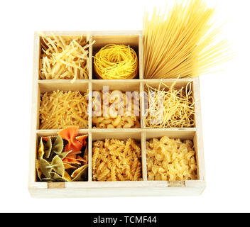 Nine types of pasta in wooden box sections isolated on white Stock ...