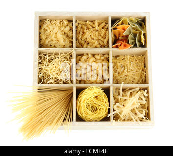 Nine types of pasta in wooden box sections isolated on white Stock ...