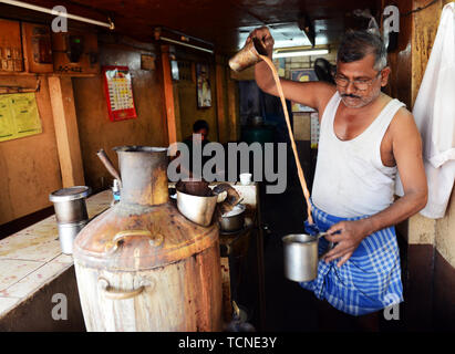 Indian Chai prepared in a small tea house in Madurai, India Stock Photo ...