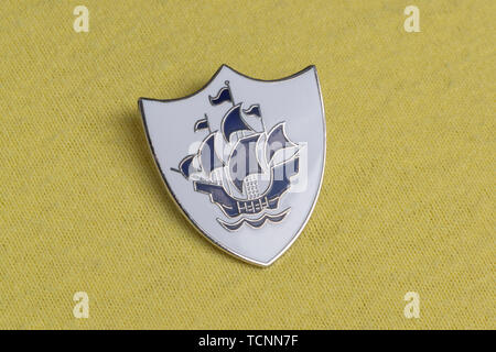 A vintage enamel Blue Peter badge from the 1970s and 1980s shot on a ...