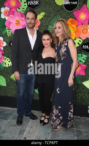 Alyssa Milano and Kim Raver at the Lifetime Summer Luau, Los Angeles ...