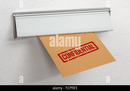 Receiving a private and confidential envelope in the office mailroom ...