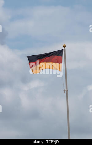 Flag of Germany - national symbol in the wind Stock Photo - Alamy