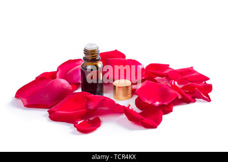 essential oils with red roses Stock Photo - Alamy