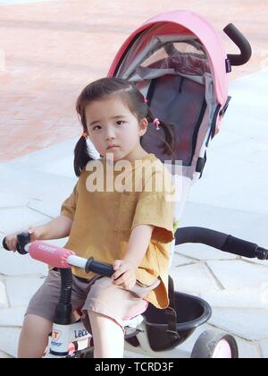 It's evening. Everyone's out for fun Stock Photo - Alamy