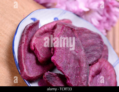 Purple potato dried purple potato strips Stock Photo - Alamy